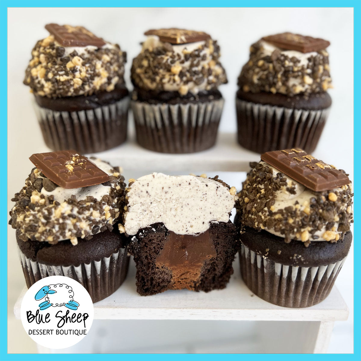 Chocolate Eclair Cupcake - STUFFED – Blue Sheep Bake Shop